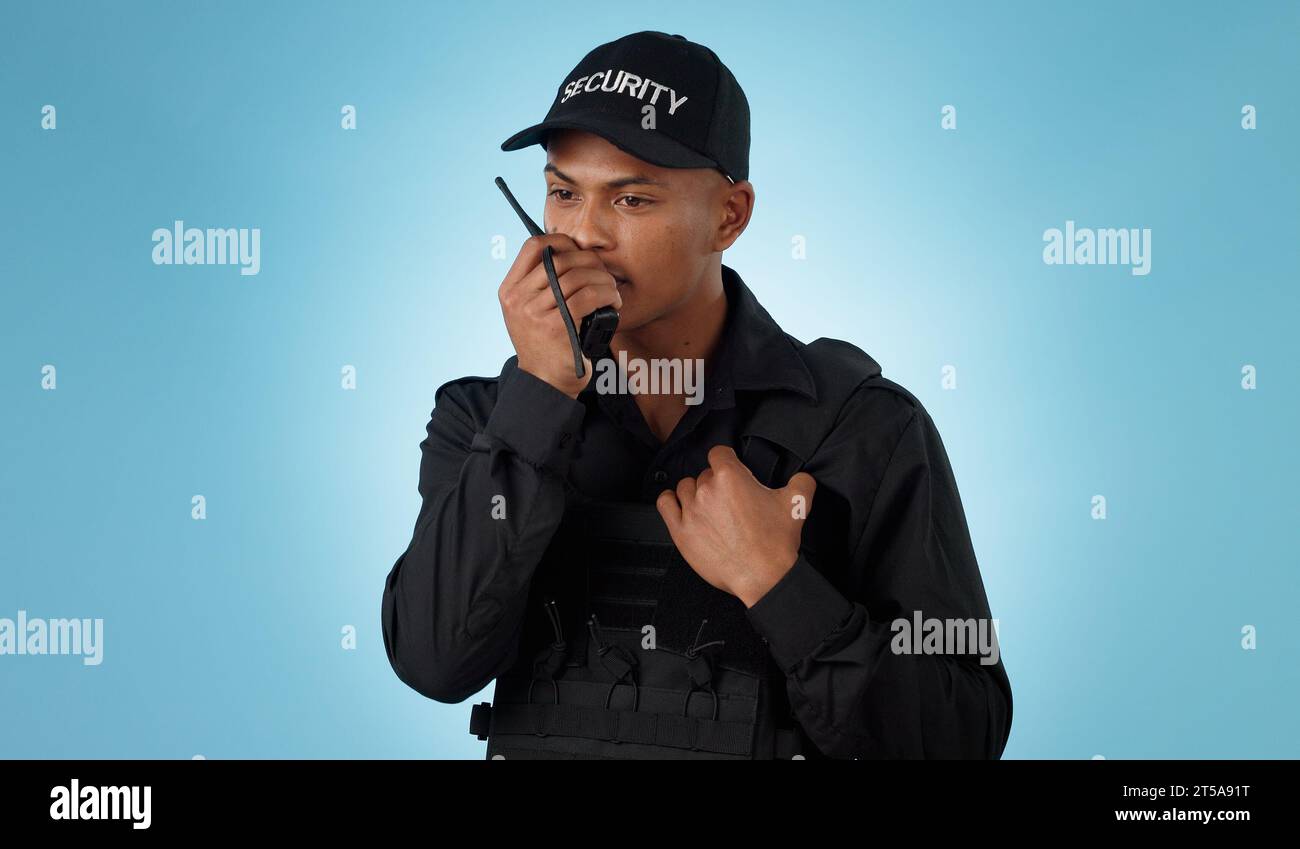 Security guard, walkie talkie and man with communication in a studio ...