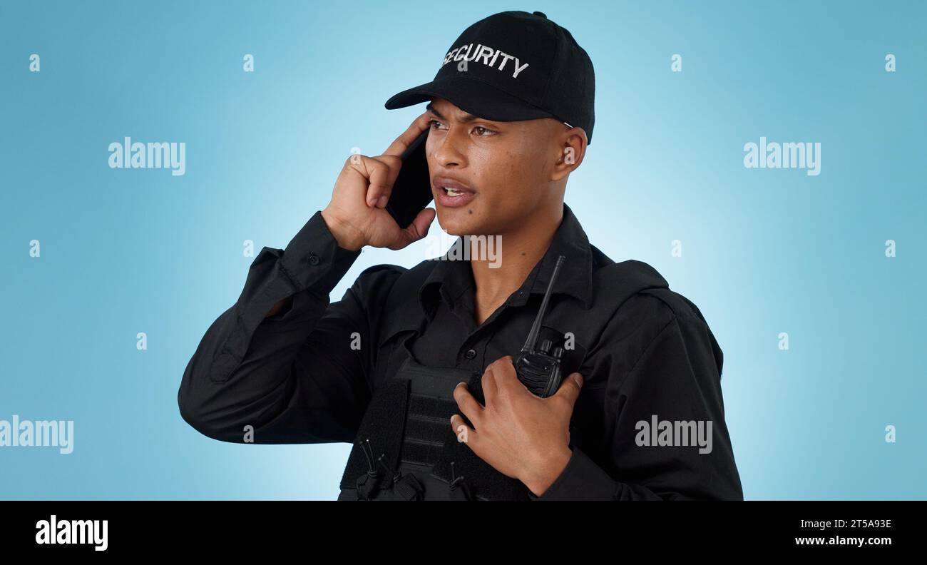 Security guard, phone call and man with communication in a studio with ...