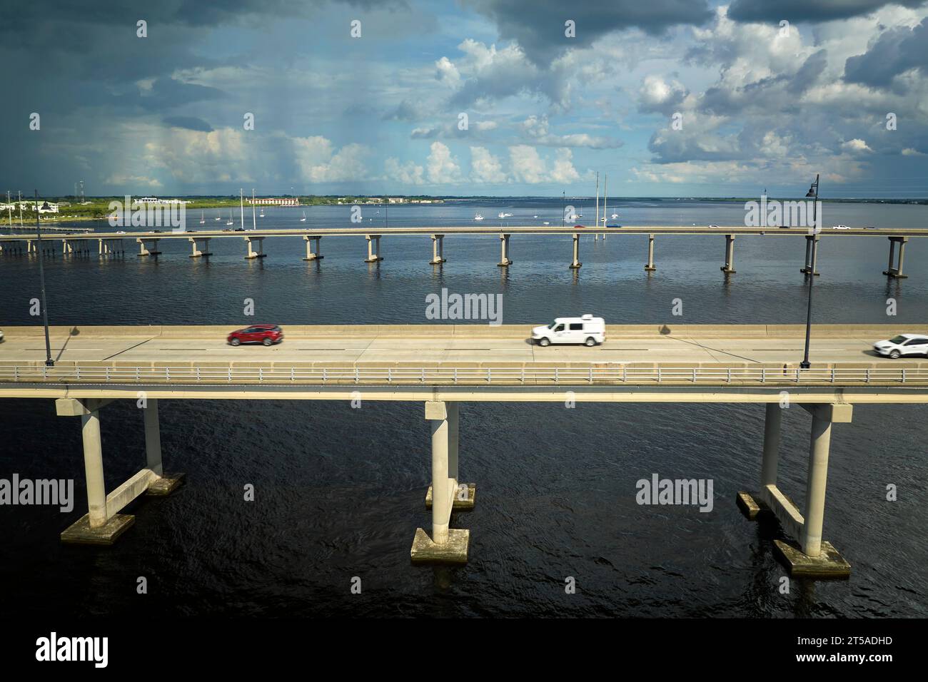 Barron Collier Bridge and Gilchrist Bridge in Florida with moving ...