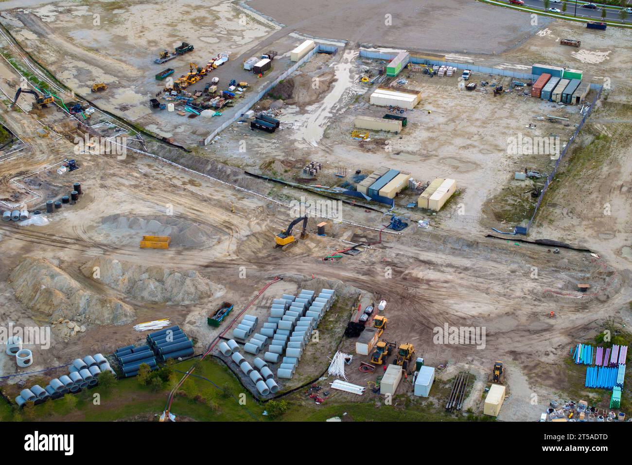 Construction site with building equipment on prepared ground in ...