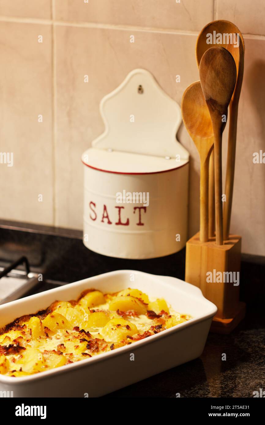 cooking at home healthy food, baked Mediterranean potatoes with cheese ...