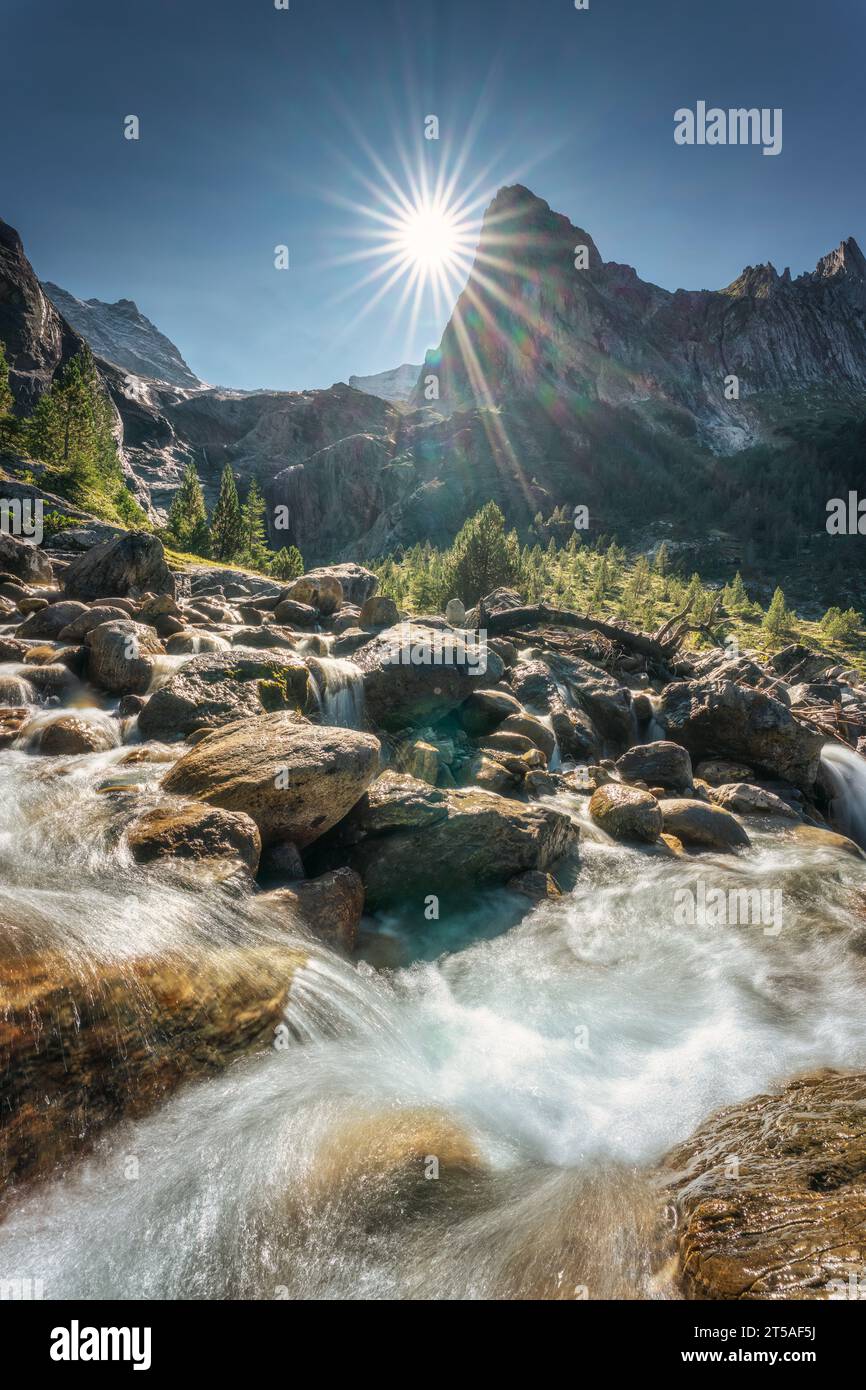 Landscape Swiss Alps of Wetterhorn peak with sunburst shine and ...