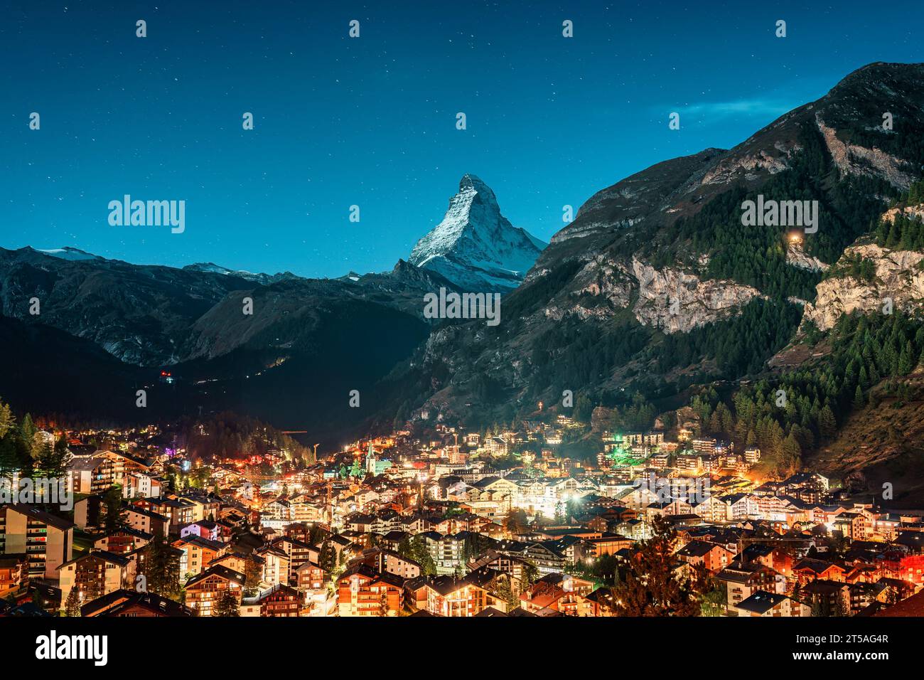 Amazing viewpoint of Zermatt rural town glowing in the alps with ...