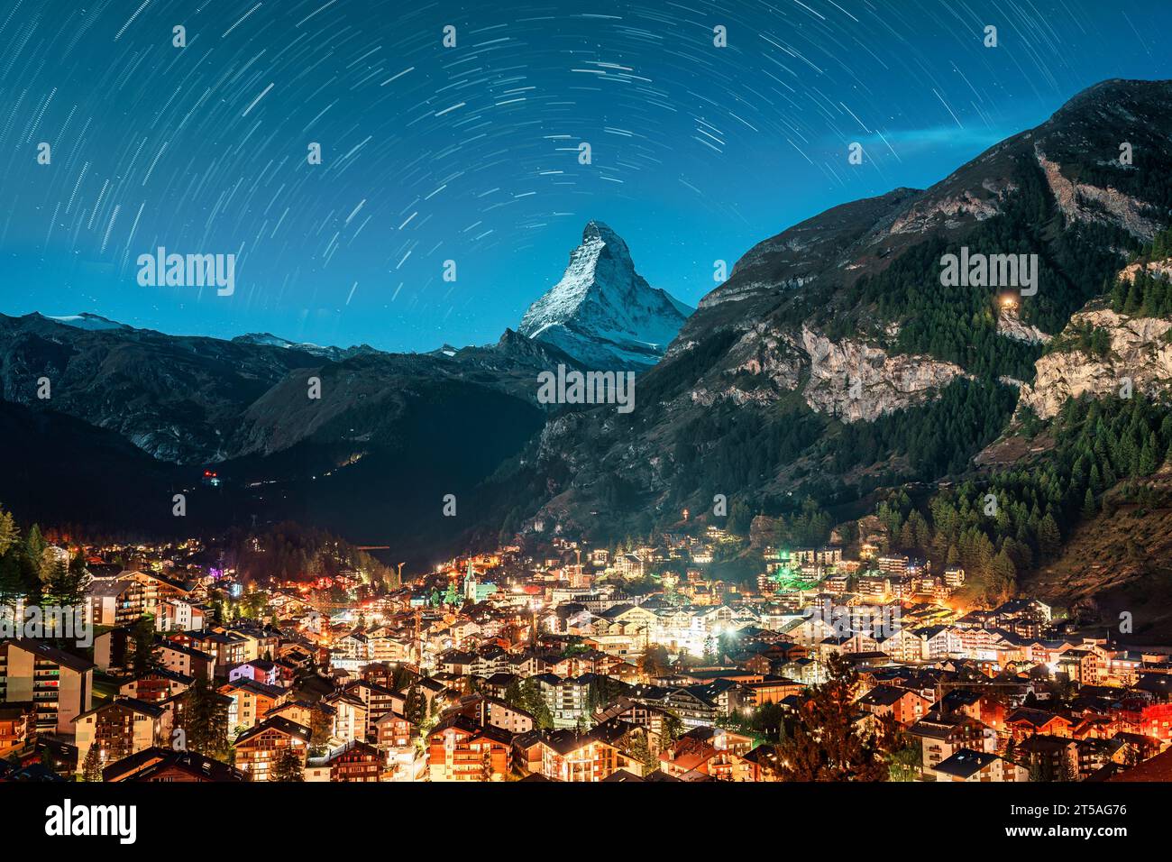 Amazing viewpoint of Zermatt rural town glowing in the alps with ...
