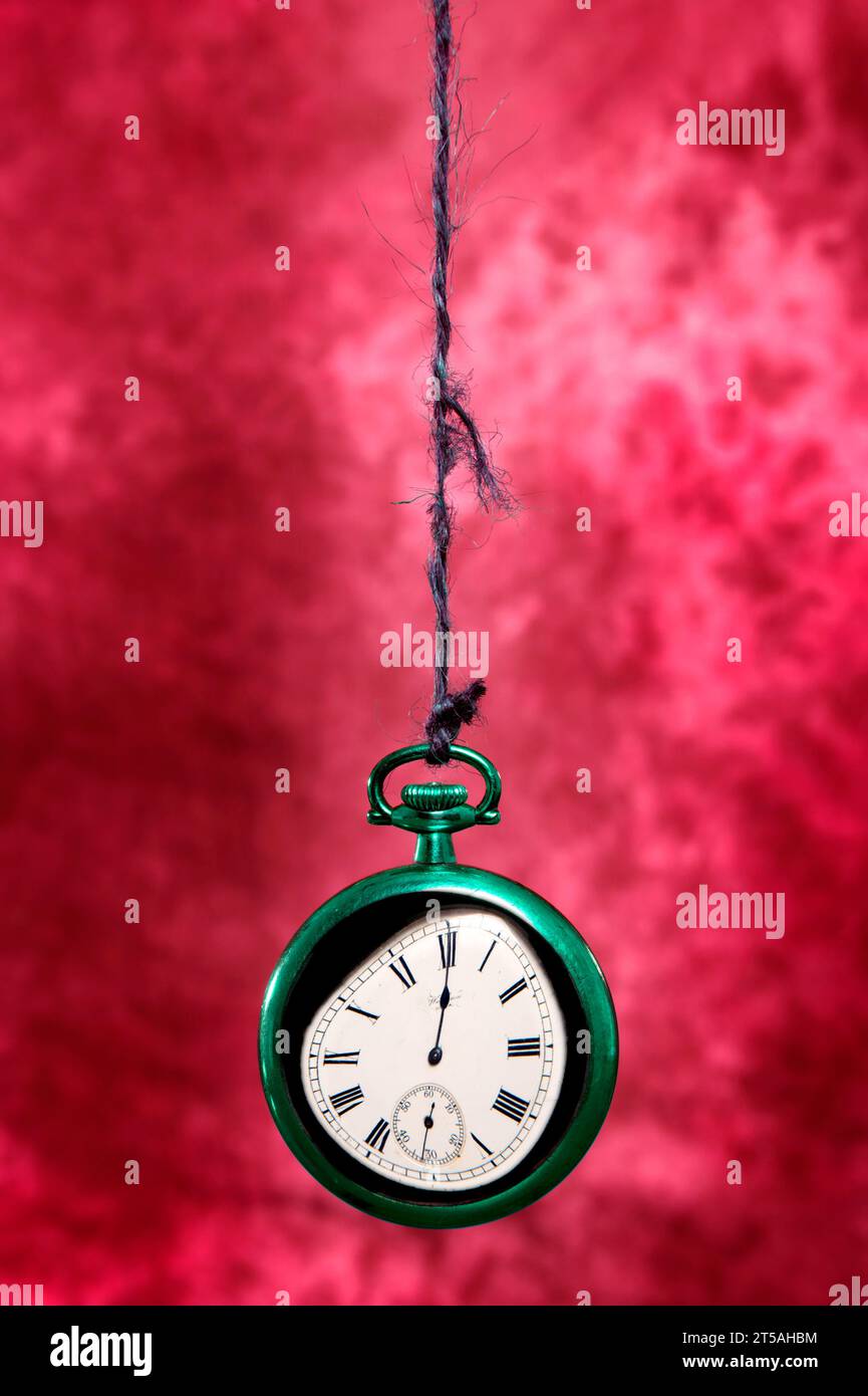Pocket watch with deformed display Stock Photo - Alamy
