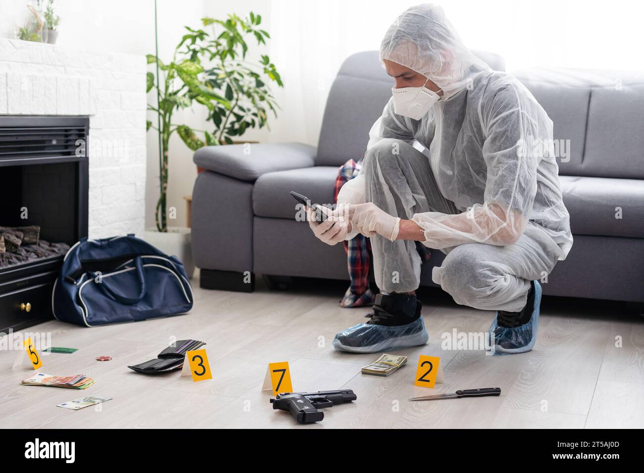 Detective Collecting Evidence in a Crime Scene. Forensic Specialists ...