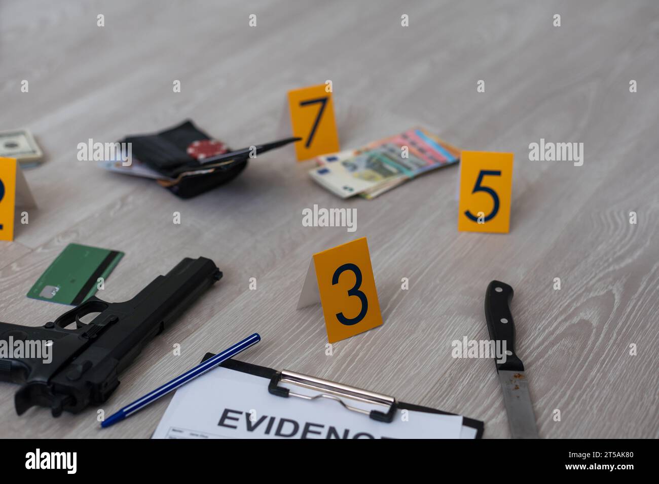 evidence markers and objects on floor of residential apartment Stock ...