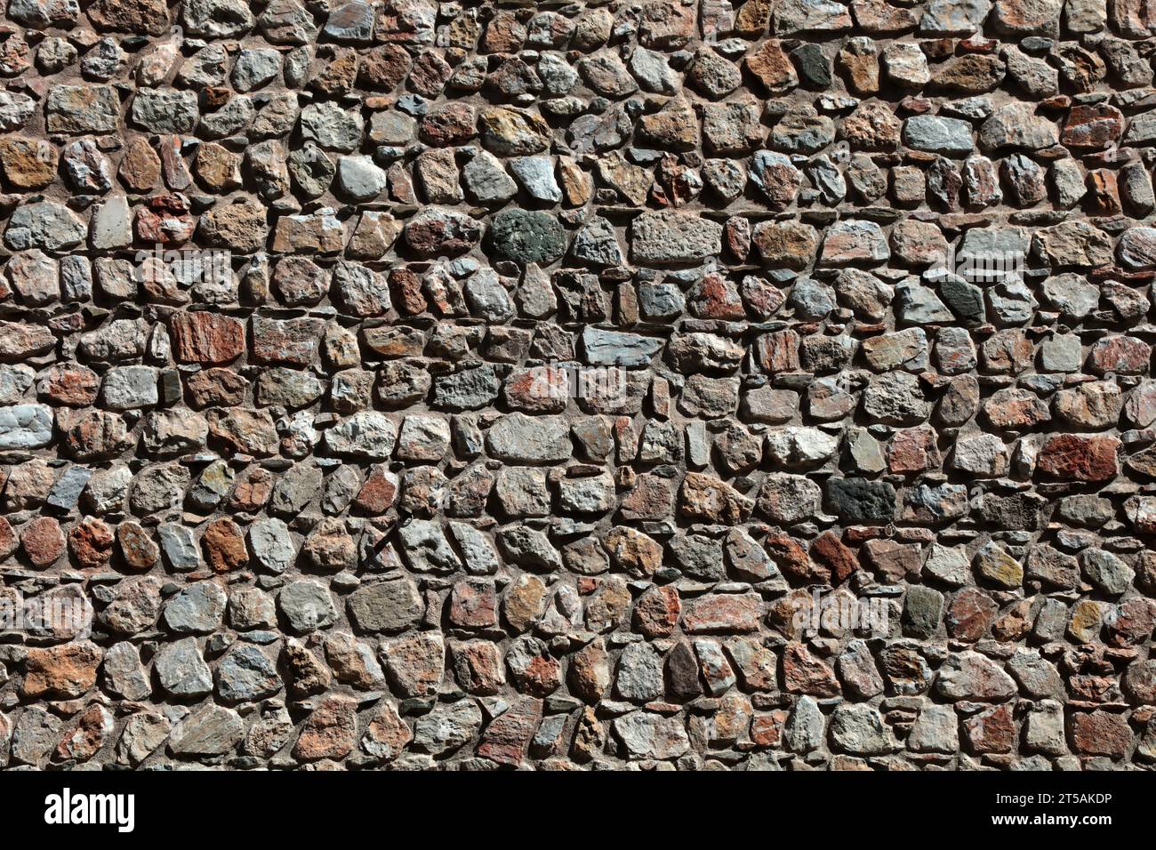 A wall made of rubble stones. Stone wall detail for backgrounds Stock ...