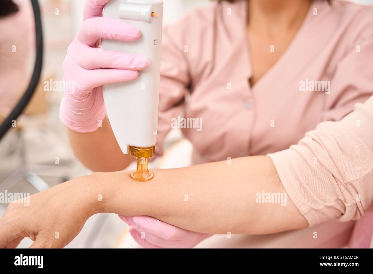 Laser hair removal procedure for hands in a specialized salon Stock ...