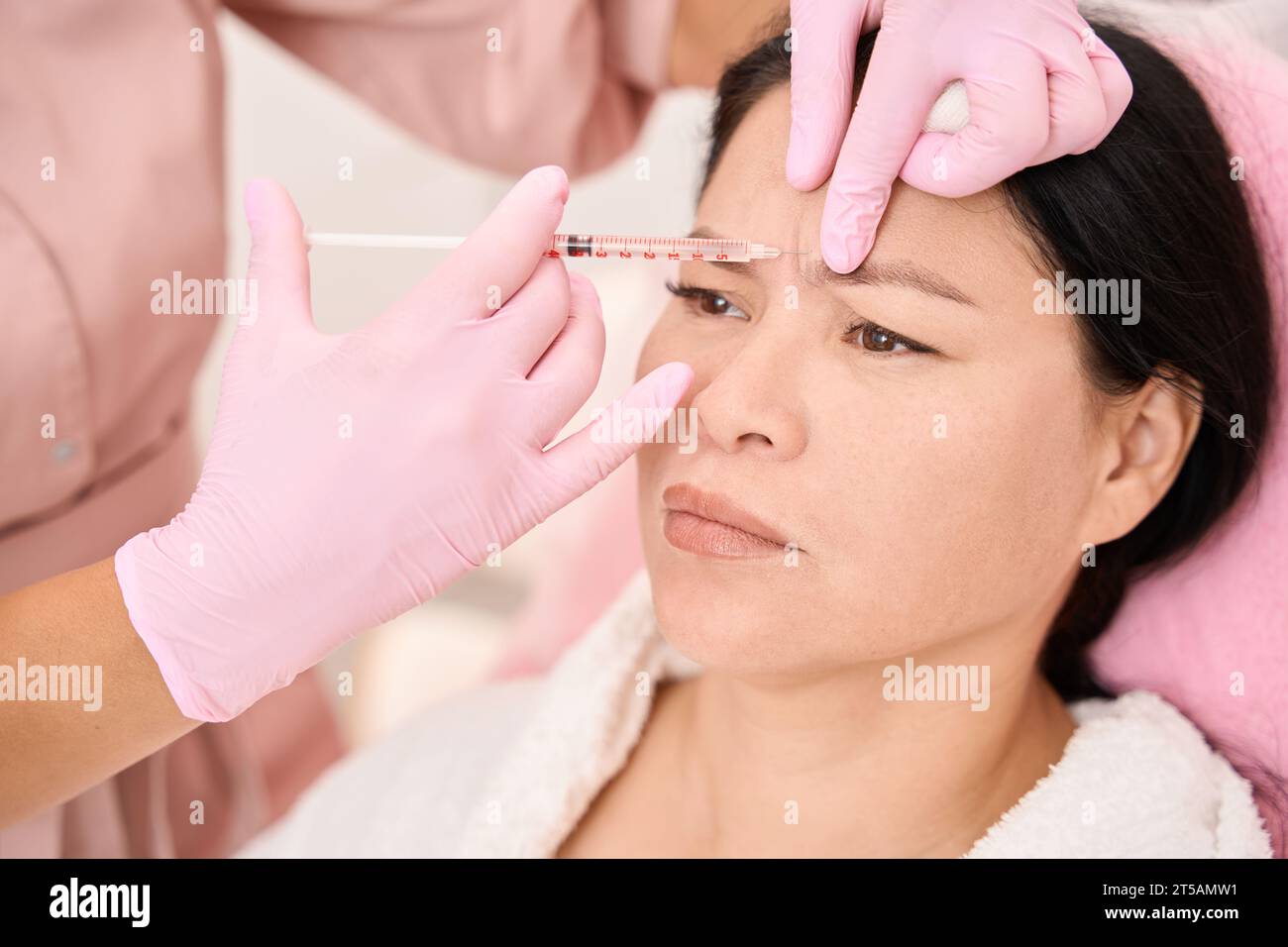 Effective injection rejuvenation procedure in a cosmetology salon Stock ...