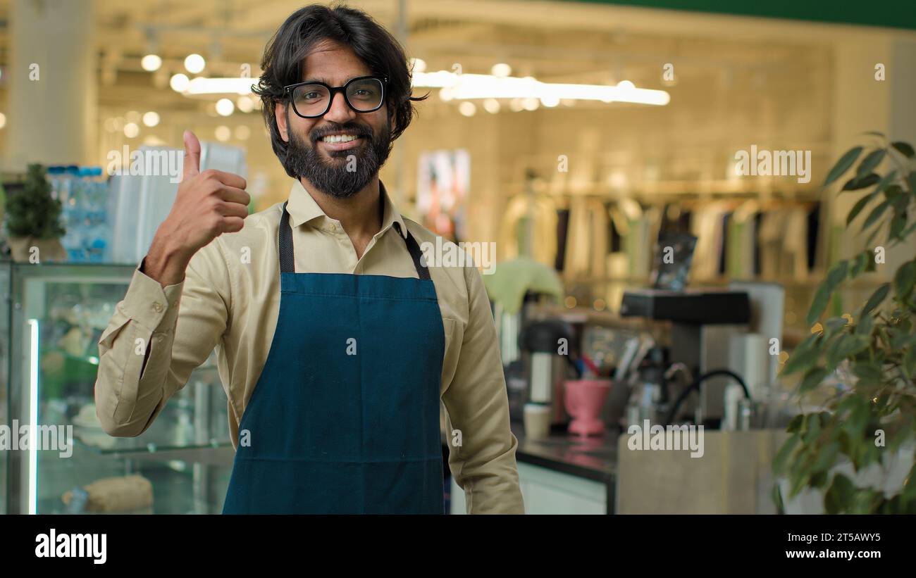 Coffee shop worker show like agree recommend gesture approve hand ...