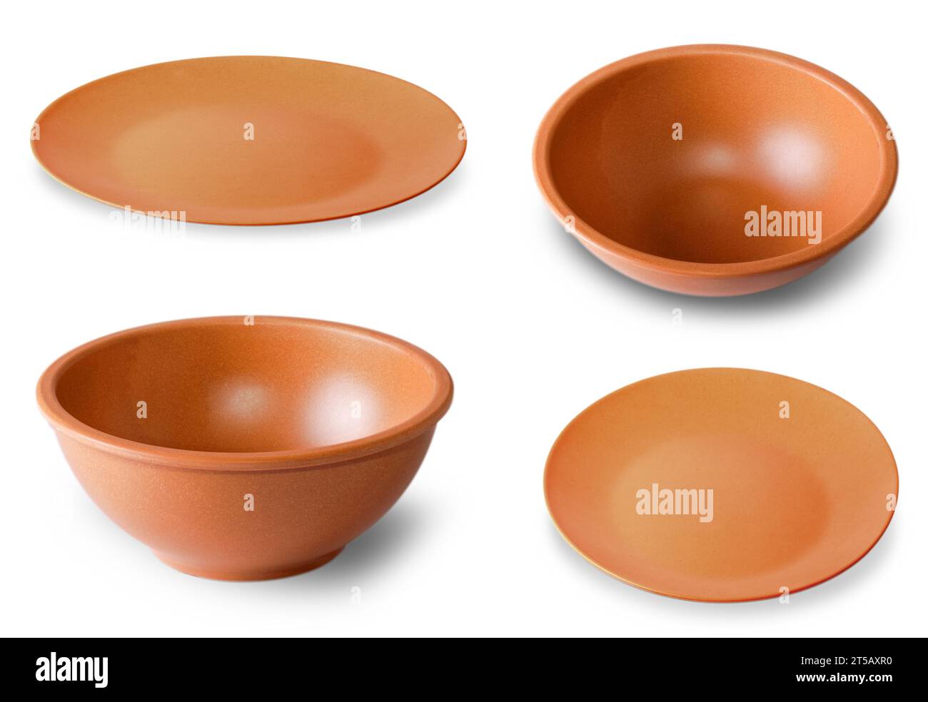 The set of clay cups and plates isolated on the white background Stock ...
