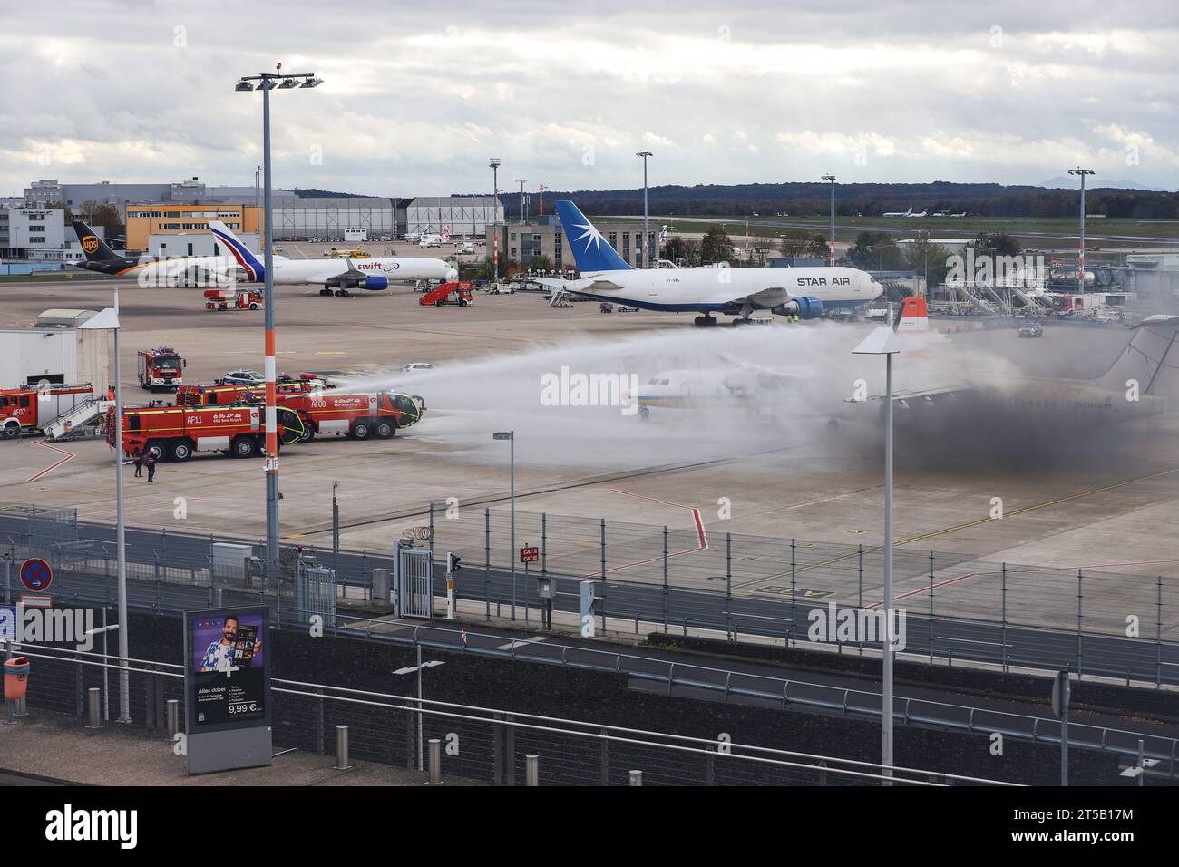 Cologne, Germany. 04th Nov, 2023. Airfield fire engines extinguish two ...