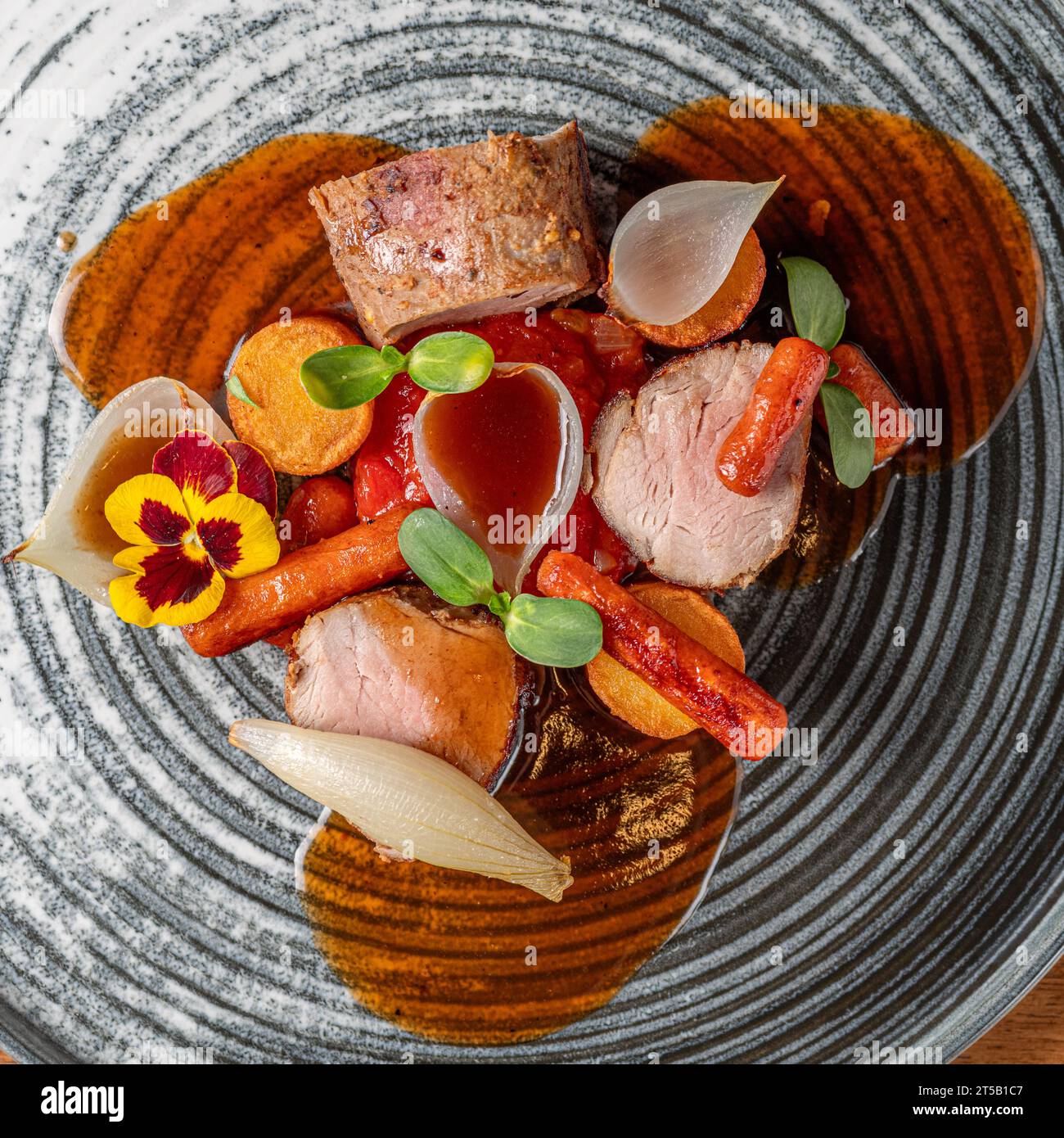 Tenderloin pork with vegetables and sauce gravy. Pork and Bacon menu ...