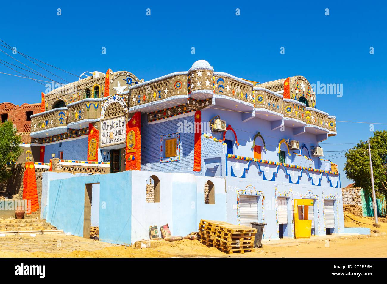 Colorful bright houses of the famous Nubian village. Aswan, Egypt ...