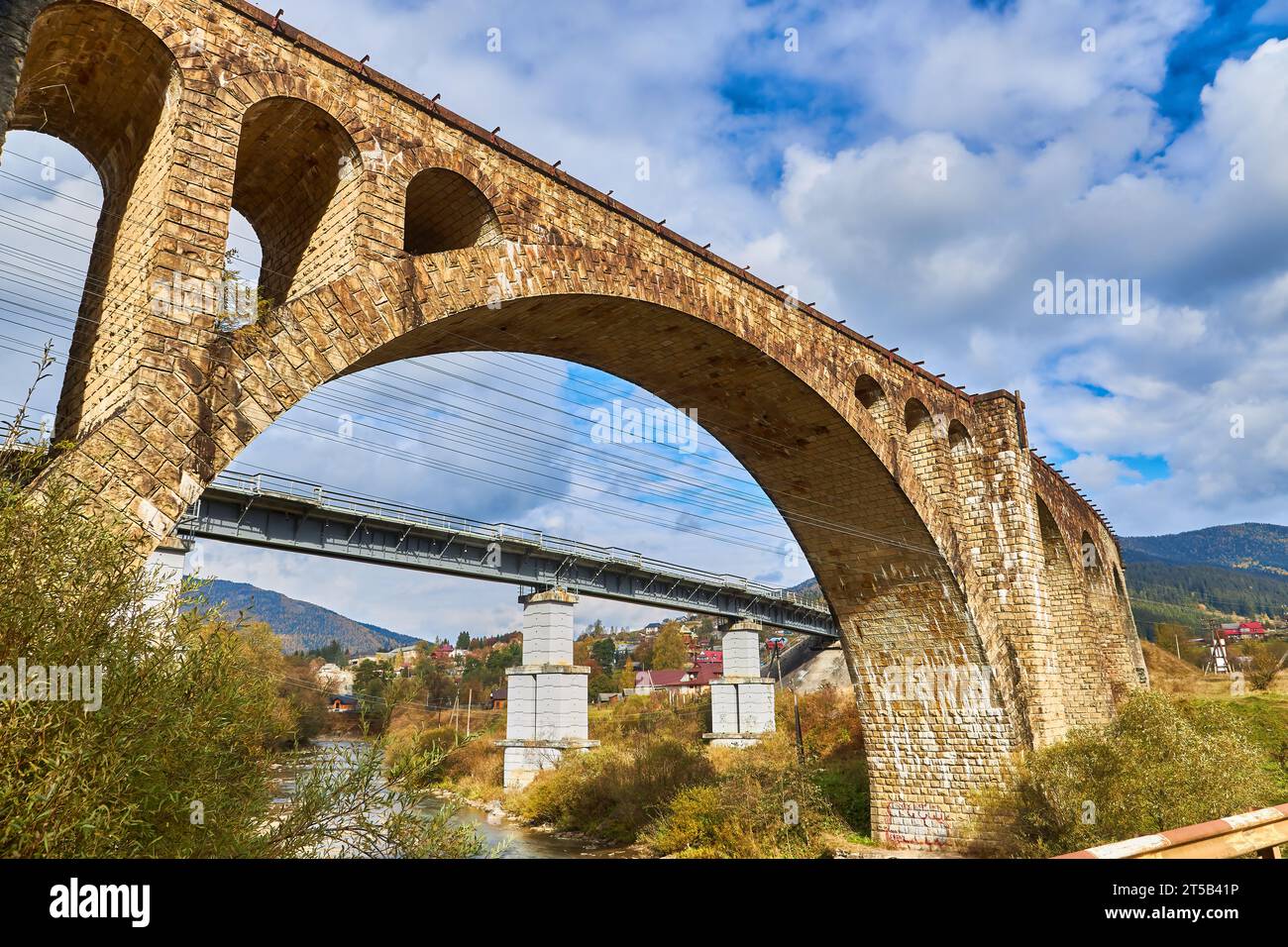 The old Austrian operating railway viaduct in the resort village of ...