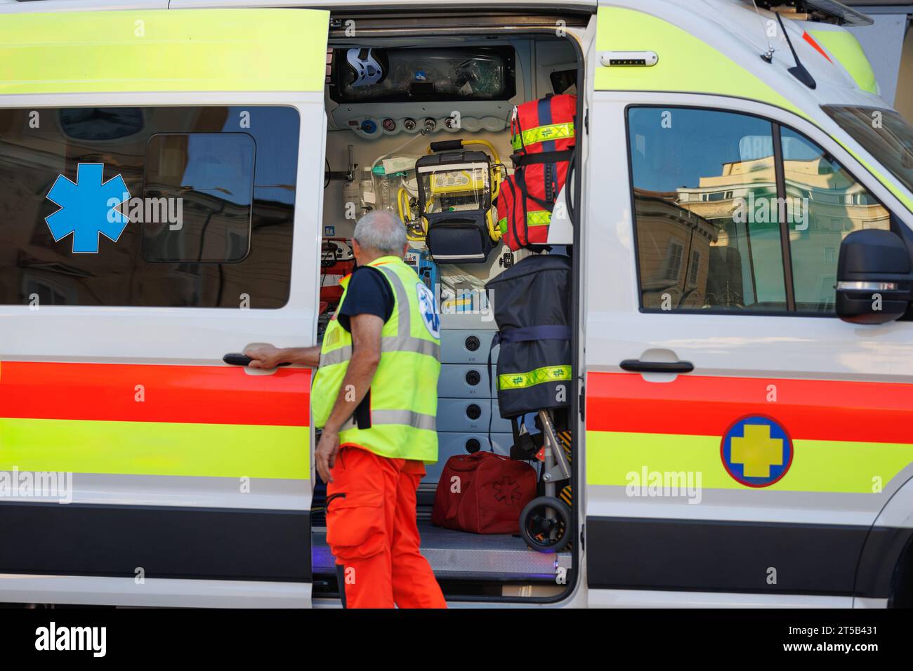 Ambulance on a City Street With Medical Personnel on Board for an ...