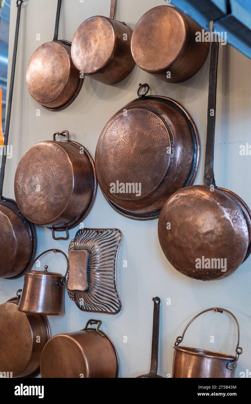 Copper Pots and Pans and other Kitchen Utensils in an Antique Kitchen ...
