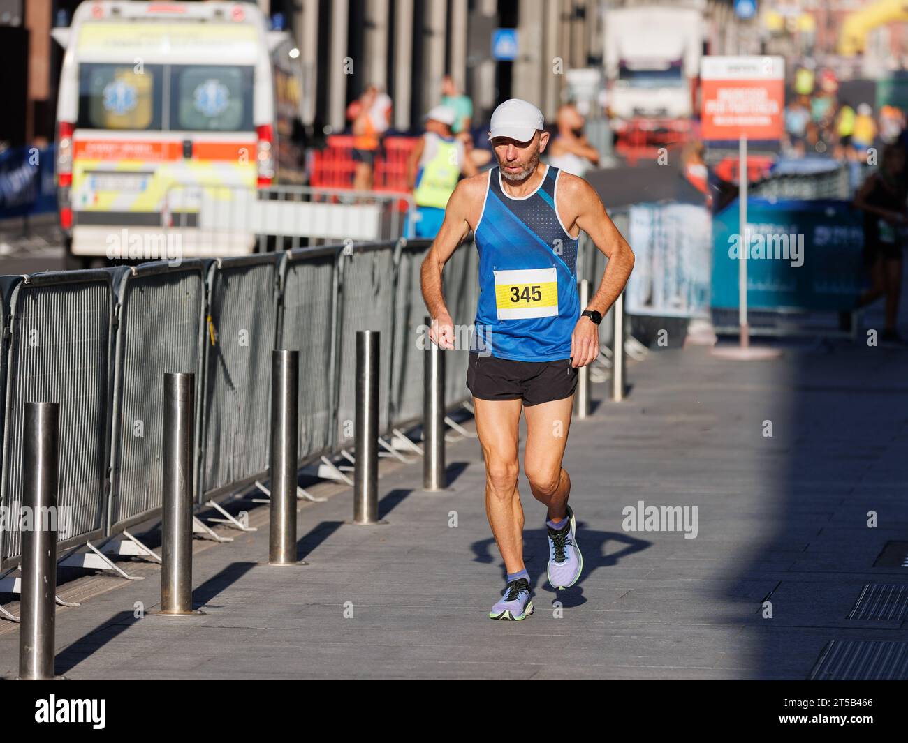 Man Running in City Marathon Stock Photo - Alamy