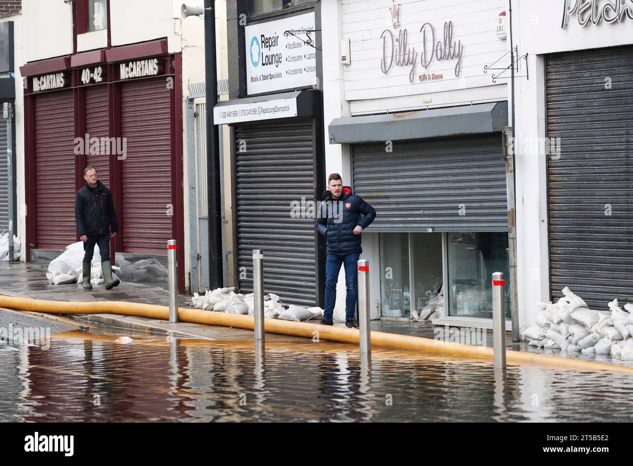 Flooded shops in the town centre after flooding in Downpatrick. Picture ...