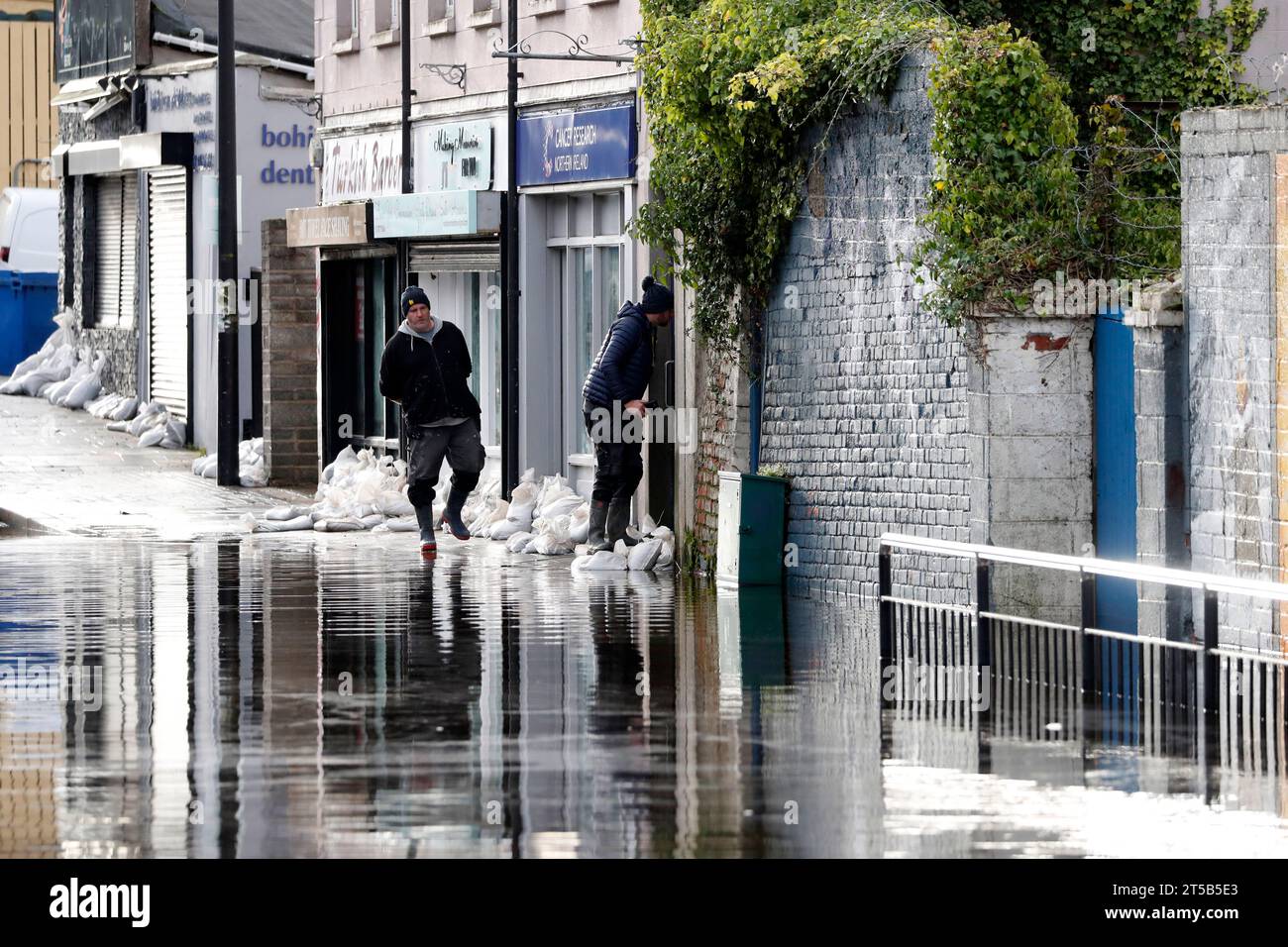 Flooded shops in the town centre after flooding in Downpatrick. Picture ...