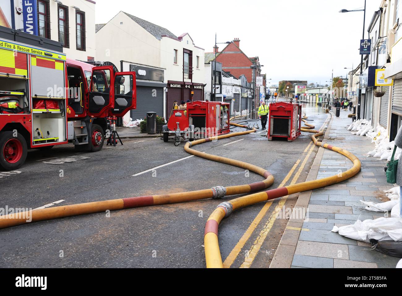 Northern Ireland Fire and Rescue Service continue to pump water from ...