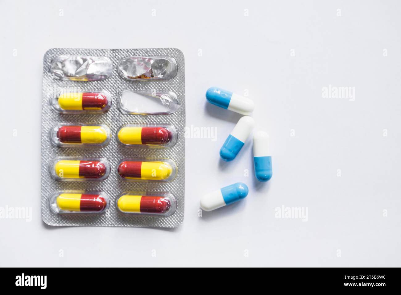Capsules drug blister pack white background Stock Photo - Alamy