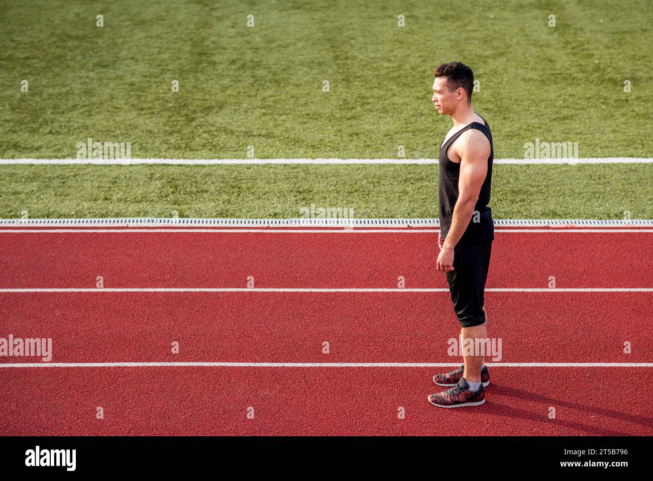 Racetrack runner hi-res stock photography and images - Alamy