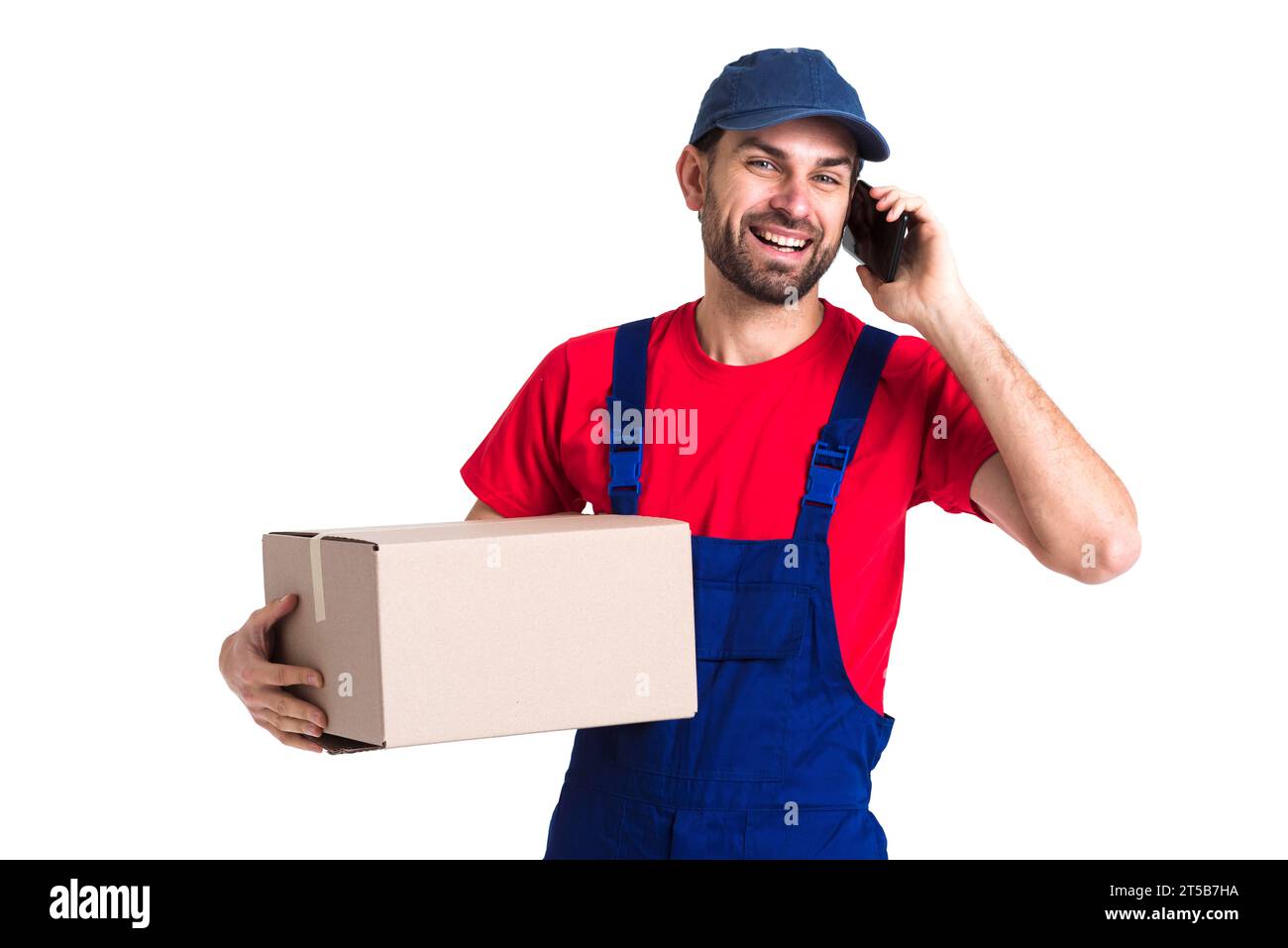 Hard worker courier man holding box talking phone Stock Photo - Alamy