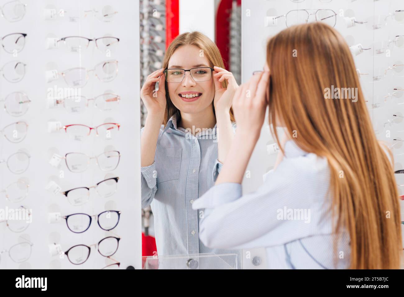 Woman choose eye glasses hi-res stock photography and images - Alamy