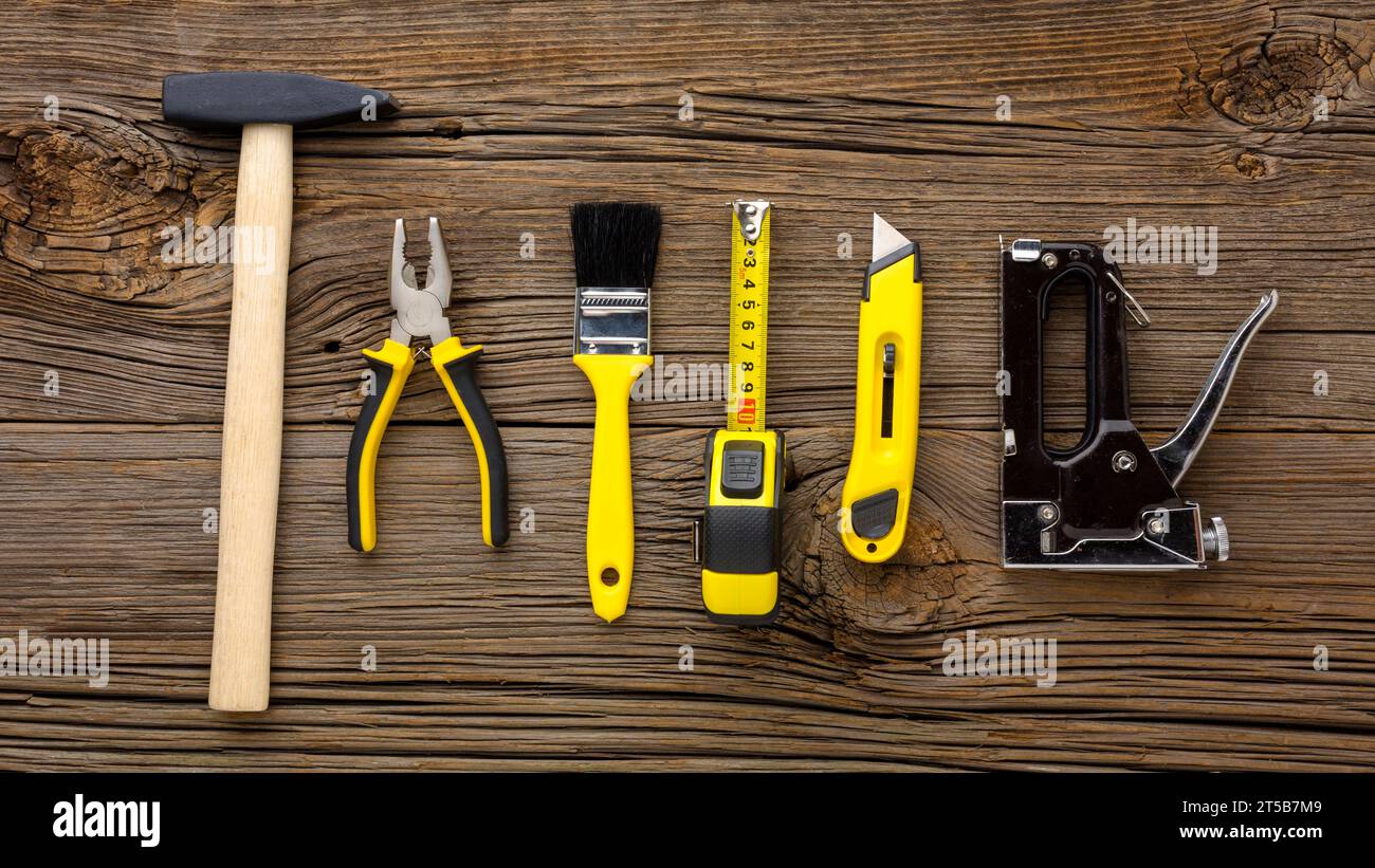 Hammer yellow repair kit tools Stock Photo - Alamy