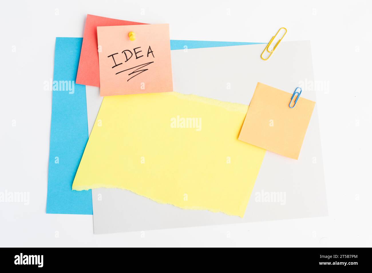 Idea text written sticky note with pushpin paperclip white board Stock ...