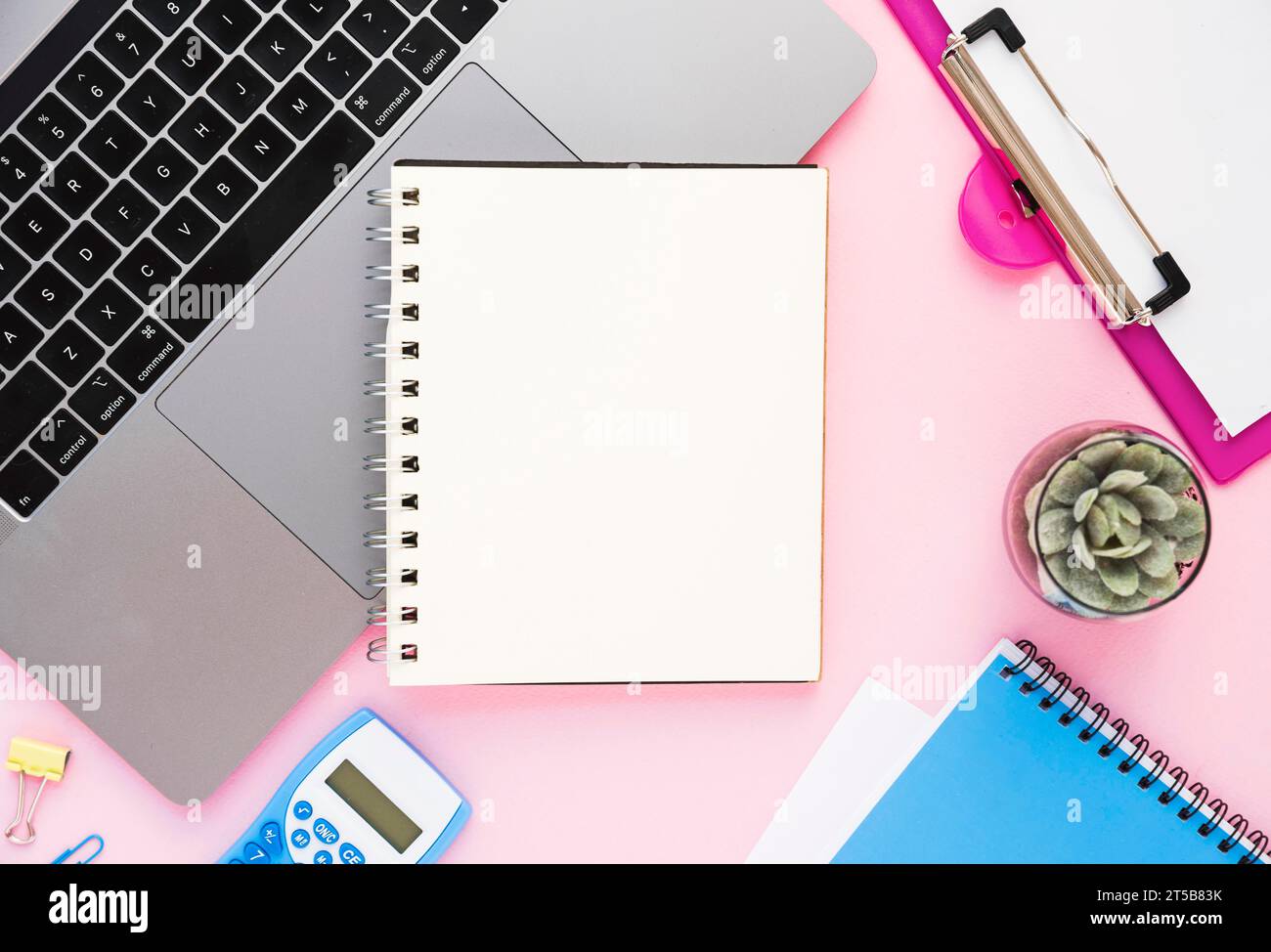 Neat office desk with notebook mockup Stock Photo - Alamy
