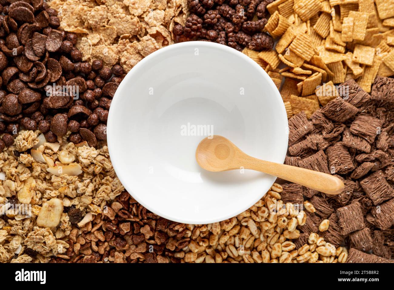 Top view assortment breakfast cereals with empty bowl Stock Photo - Alamy