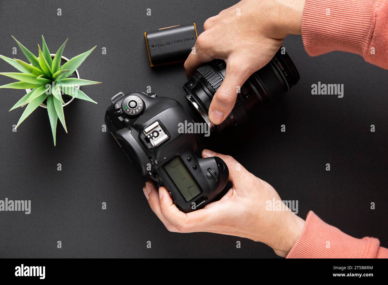 Top view camera concept with black background Stock Photo - Alamy
