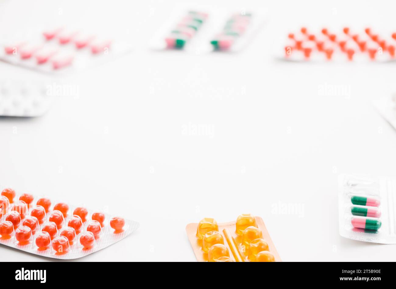 Various type colorful pills isolated white background with space ...