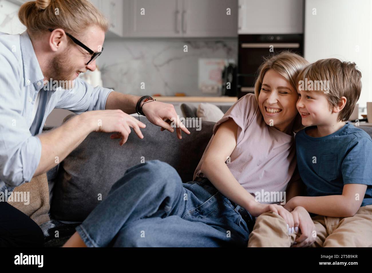 Close up parents kid having fun Stock Photo - Alamy