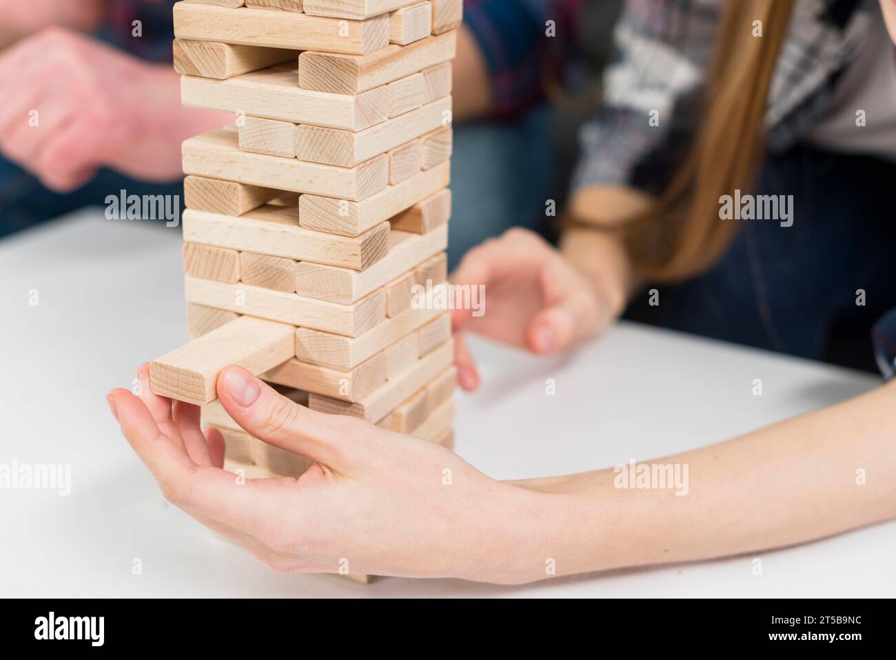 Wooden building block tower hi-res stock photography and images - Alamy