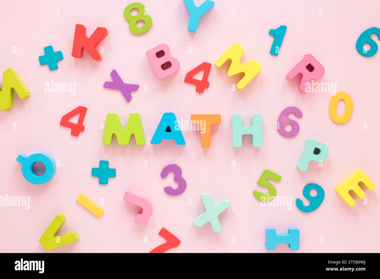 Colourful math numbers letters top view Stock Photo - Alamy