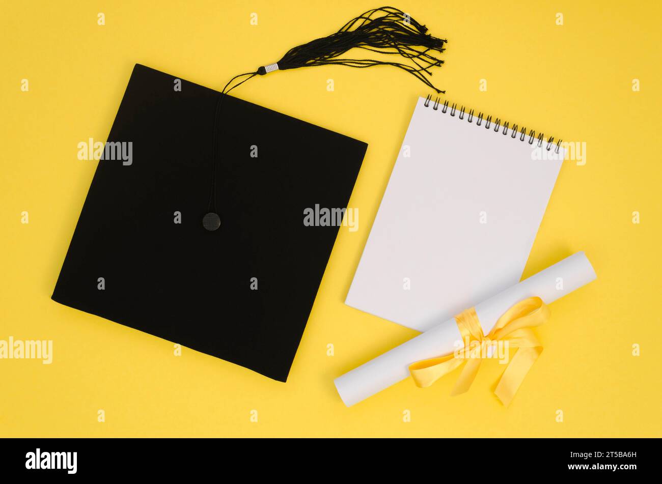 Flat lay festive graduation arrangement with empty notepad Stock Photo ...