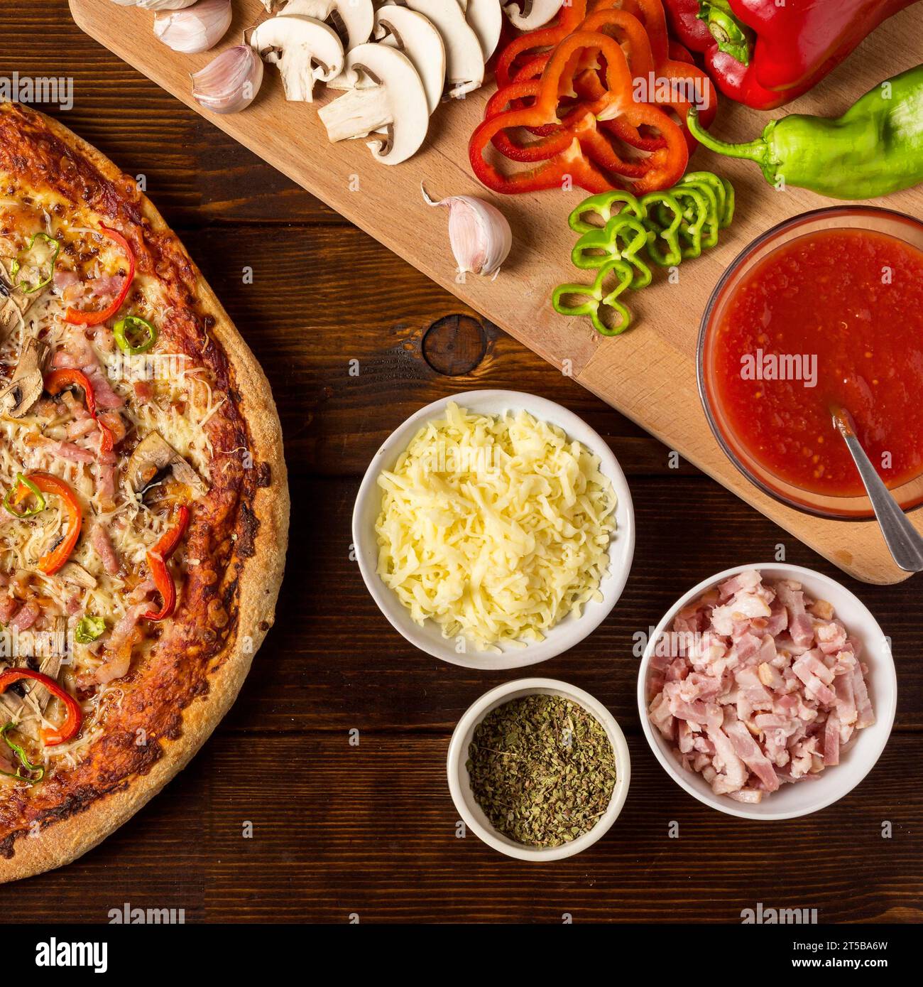 Flat lay pizza with pepper ingredients Stock Photo - Alamy