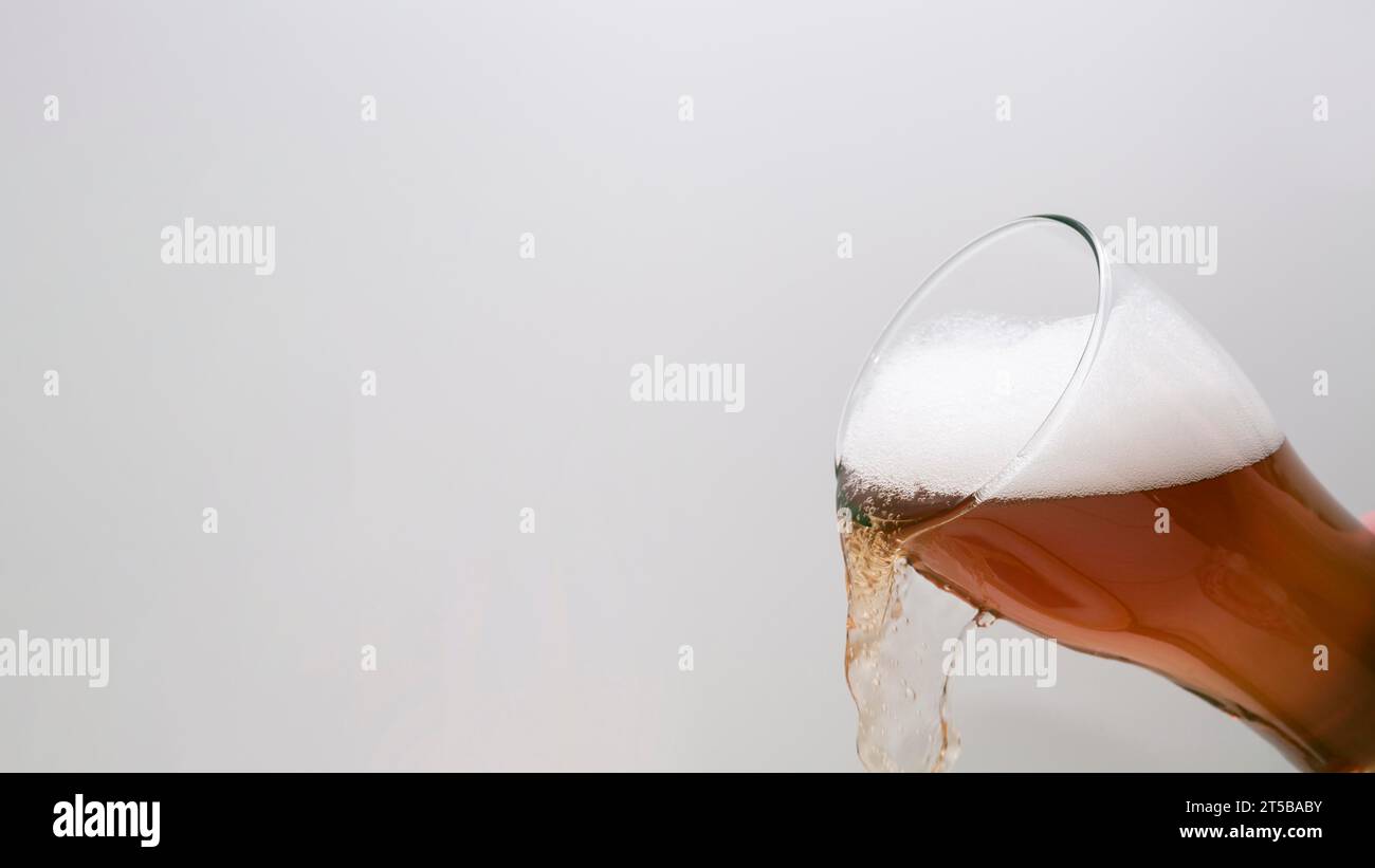 Pour beer water glass hi-res stock photography and images - Alamy