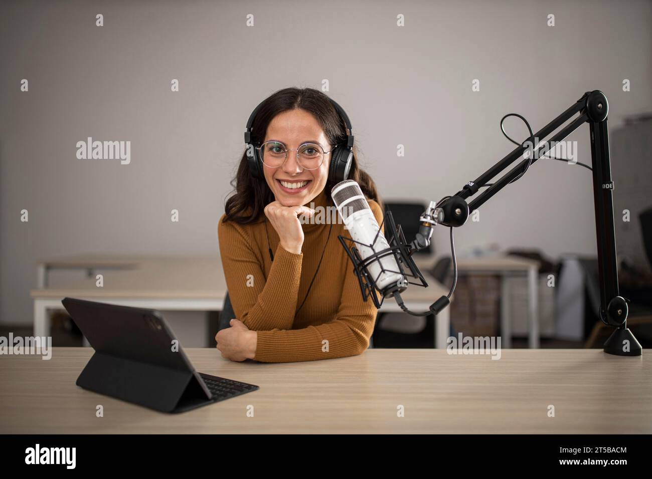 Front view woman broadcasting radio Stock Photo - Alamy