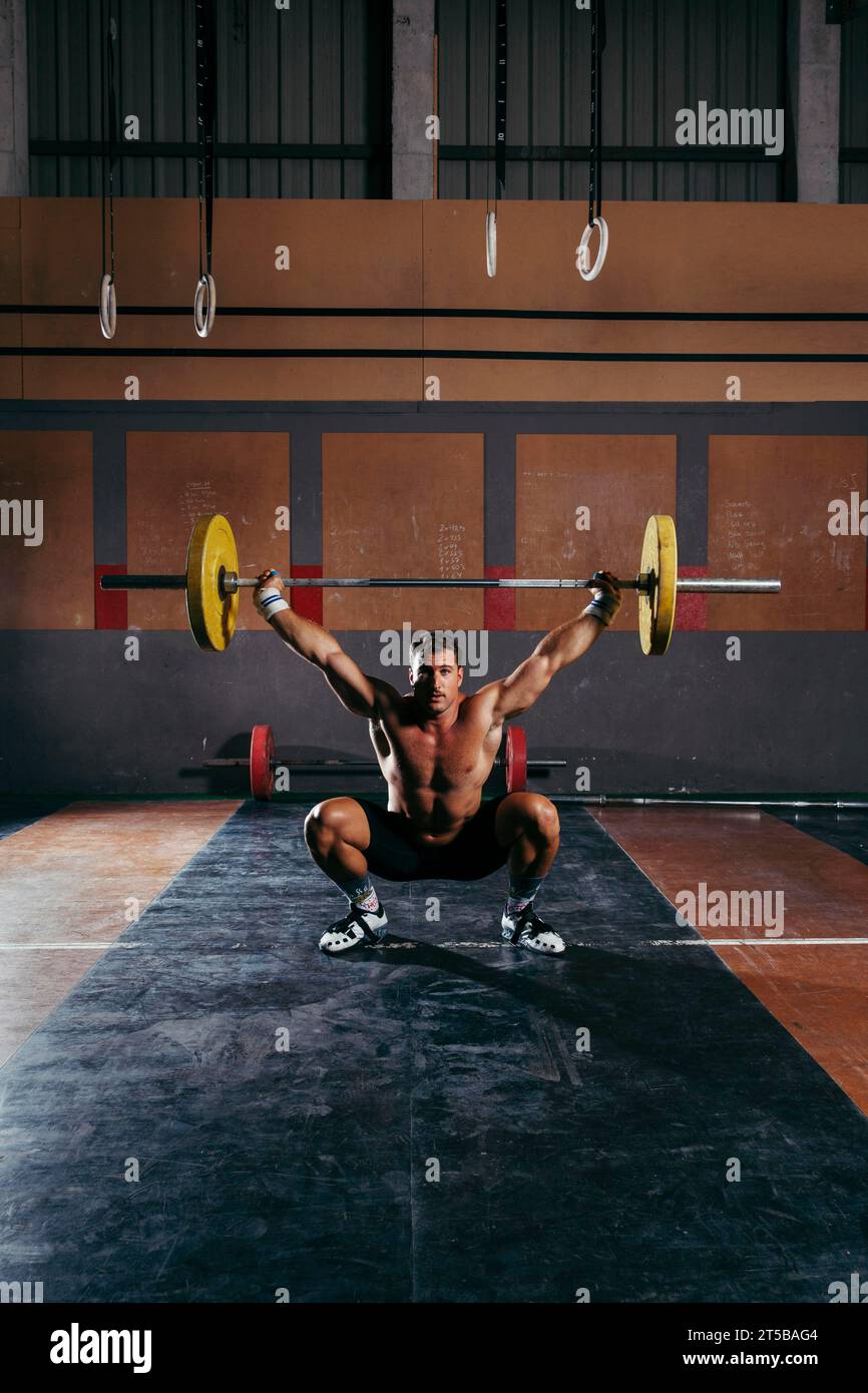 Gym concept with man working out Stock Photo - Alamy