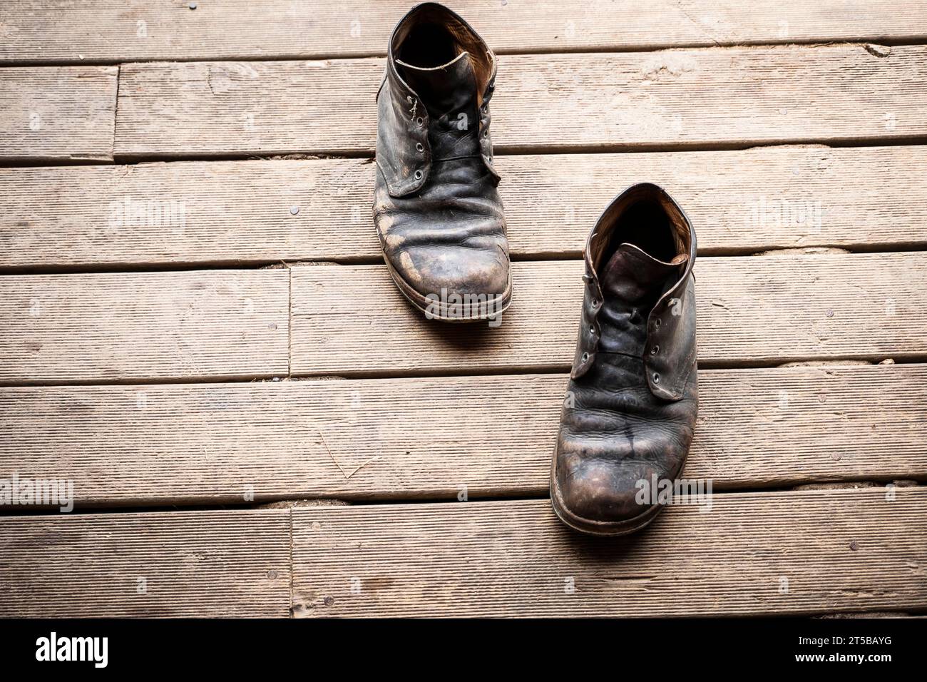 Worn-out shoes of a travelling companion, Siegburg, Germany Stock Photo ...