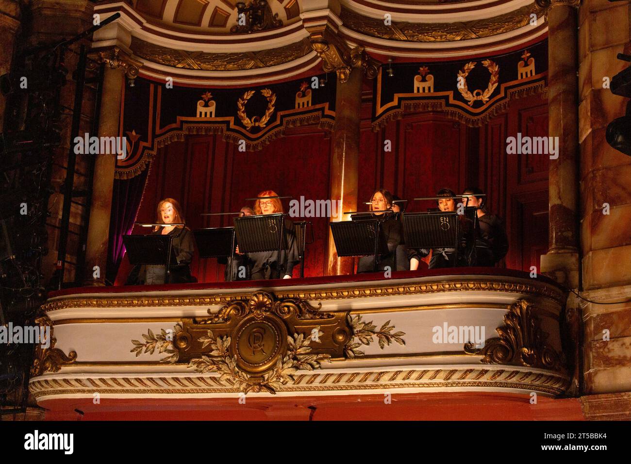 members of the ladies chorus in a dress circle box singing offstage at ...