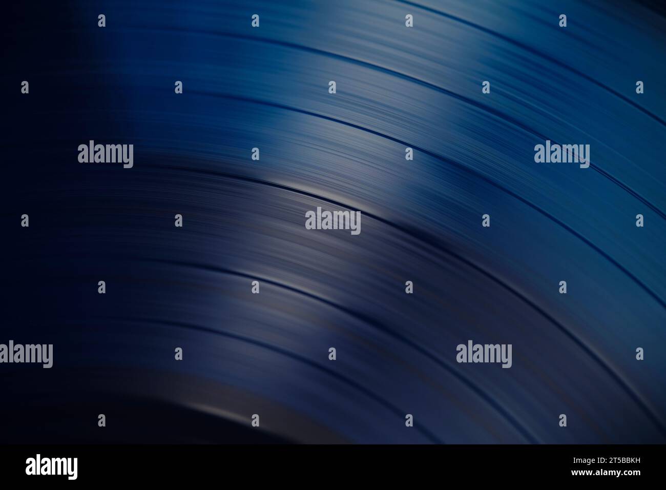 Sound tracks on a vinyl blue record closeup macro photo Stock Photo - Alamy