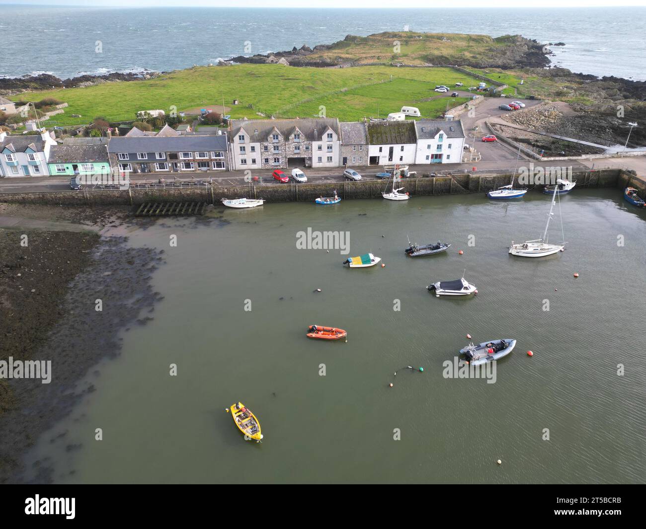 Aerial view of Isle of Whithorn coastal village and harbour in ...