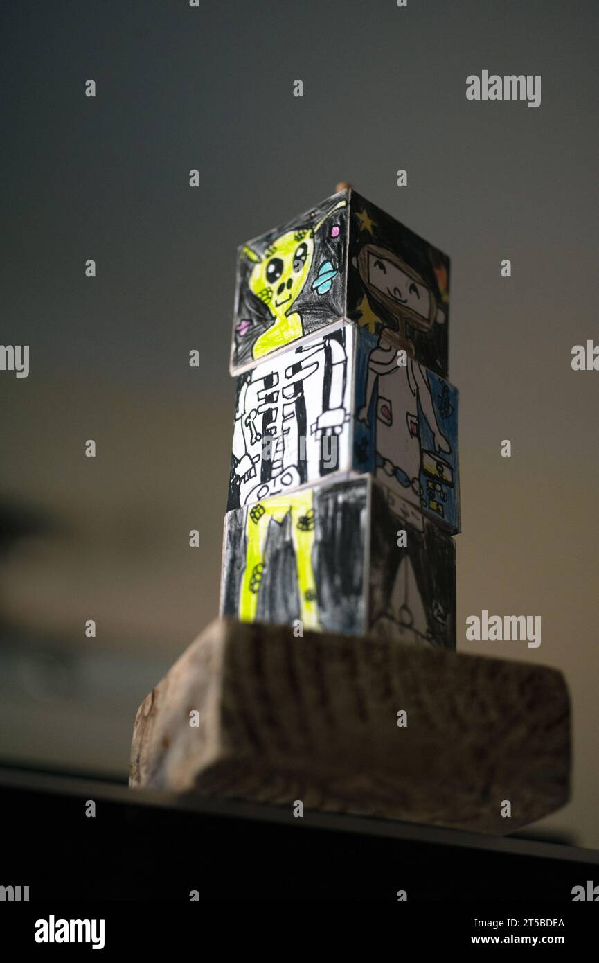 rotating childs homemade cube toy Stock Photo - Alamy