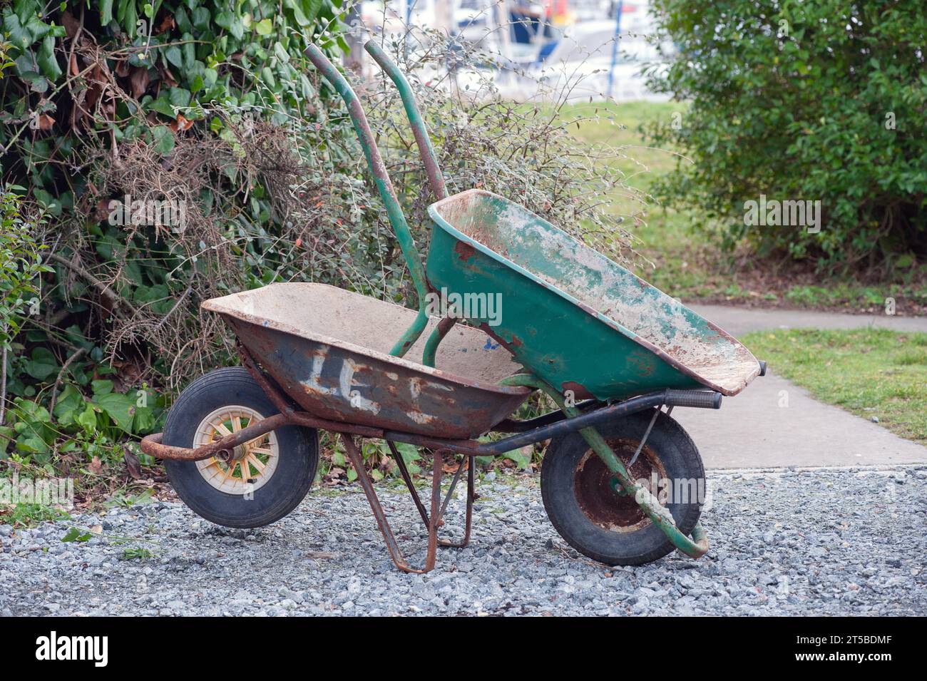 two stacked builders wheel barrows Stock Photo - Alamy